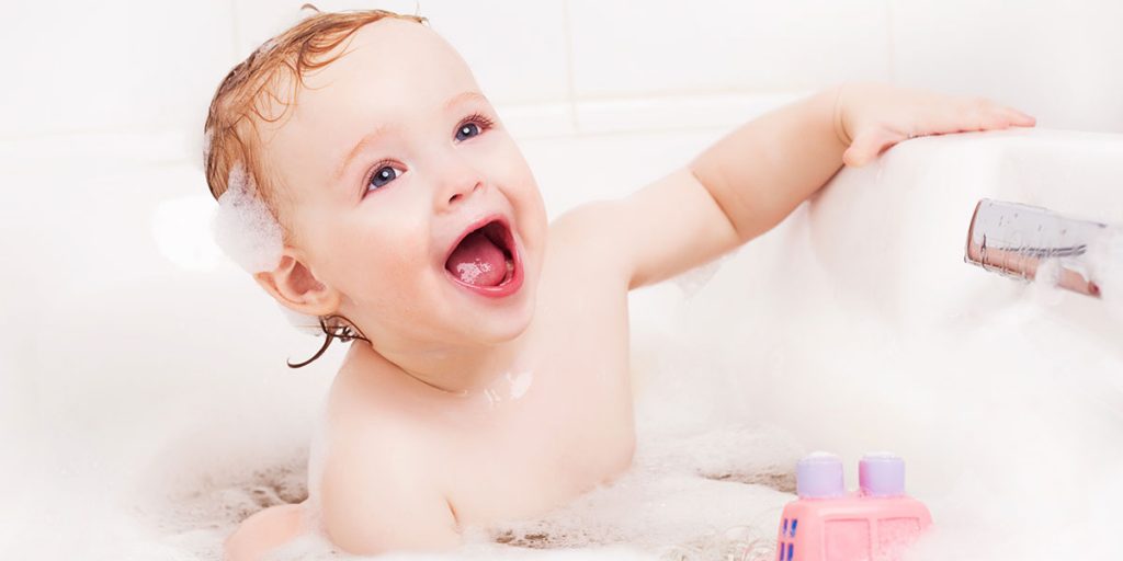 Babies love water, all you have to do is set out the water and get playful.